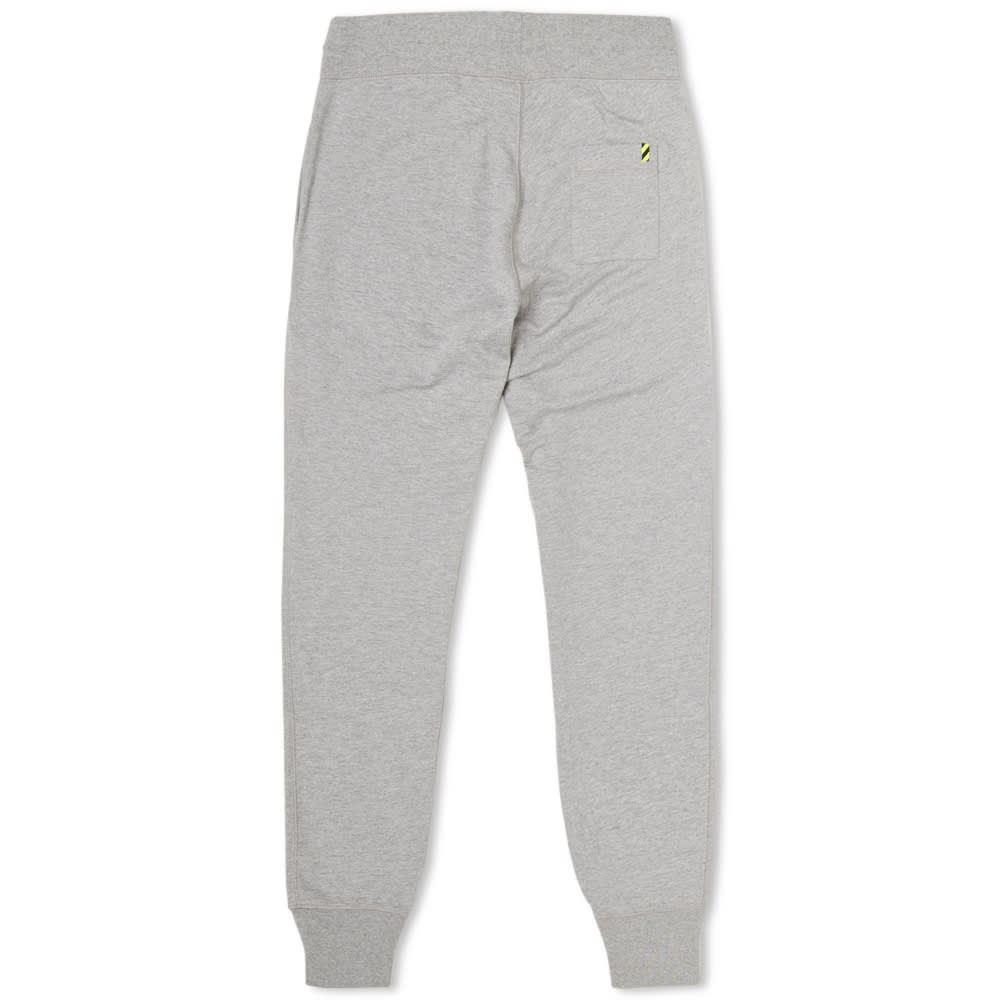 Nike RU Slim Cuff Pant Dark Grey Heather | END. (Global)