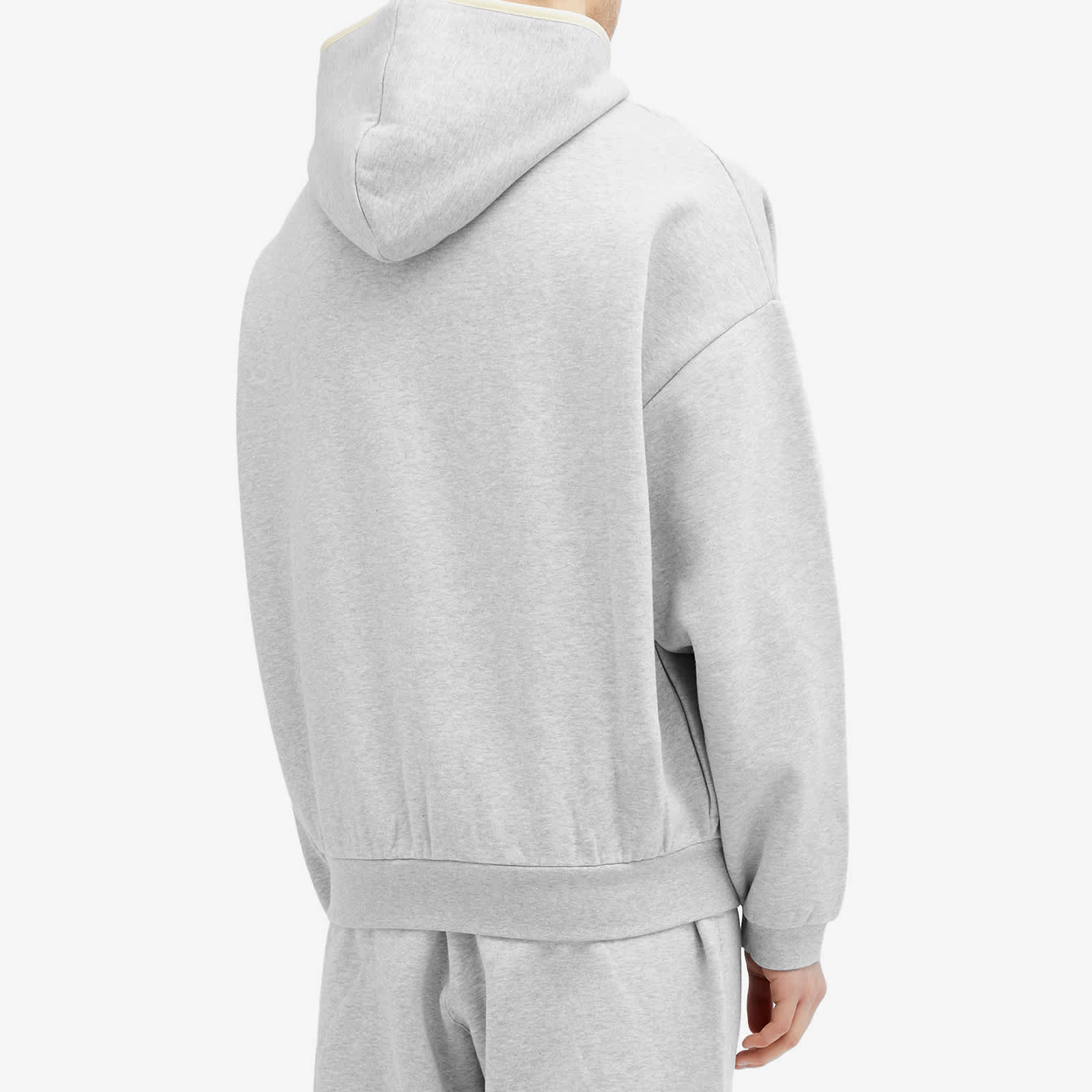 Fear of God ESSENTIALS Spring Tab Detail Hoodie Light Heather Grey ...