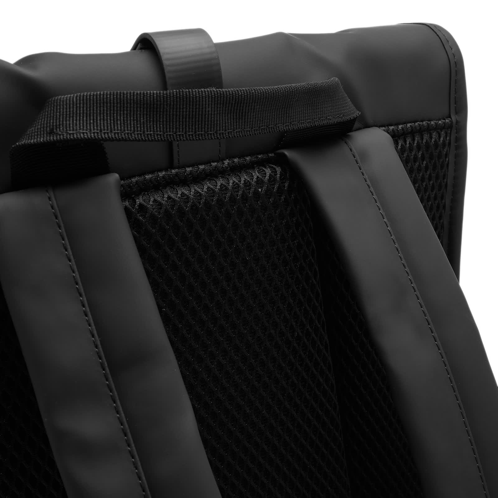 RAINS Rolltop Rucksack Black | END. (GB)