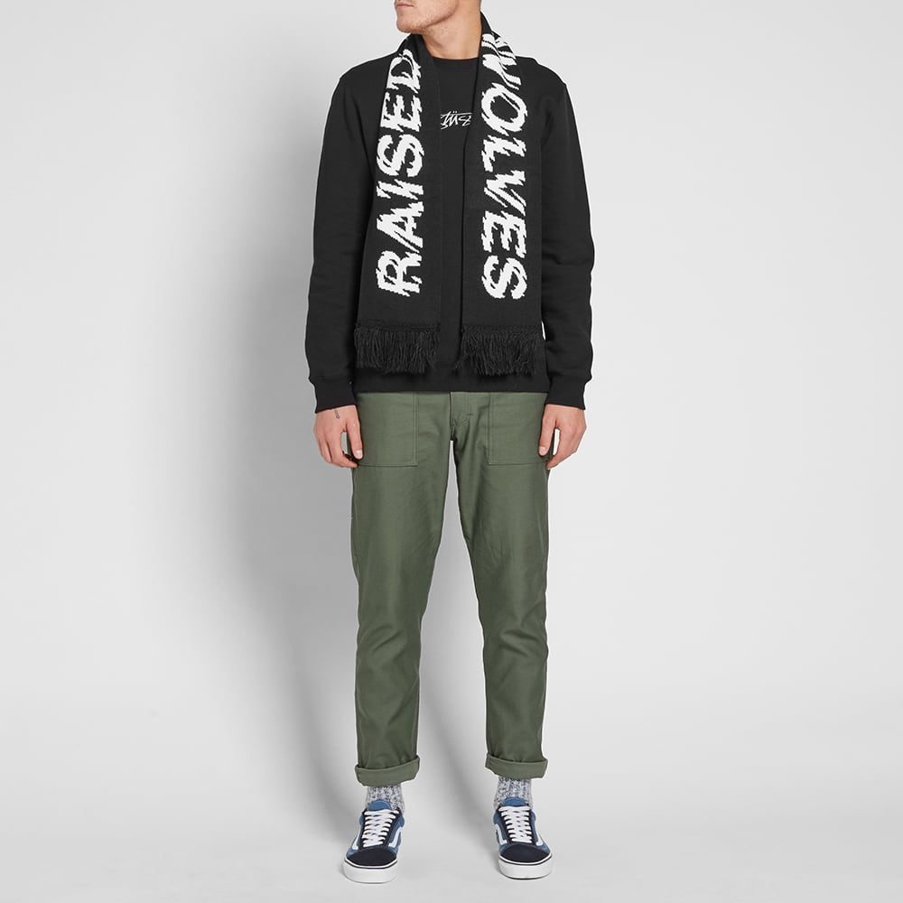 Raised by Wolves Shatter Football Scarf Black | END. (US)